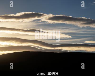 Weird shaped clouds over Austwick in the Yorkshire Dales at dusk during ...