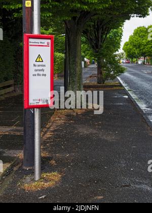 Bus stop with service suspended Stock Photo - Alamy