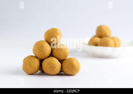 Stack of Dankwa, (maize-peanut balls) snack Hausa delicacy isolated ...