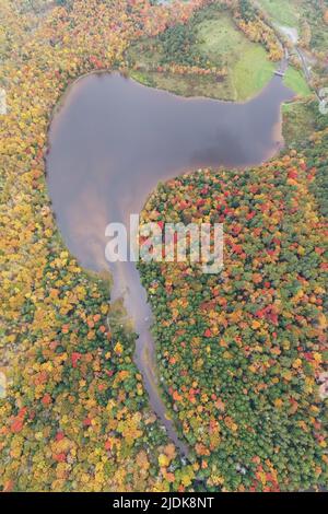 Colgate Lake in Upstate New York during peak fall foliage season Stock ...