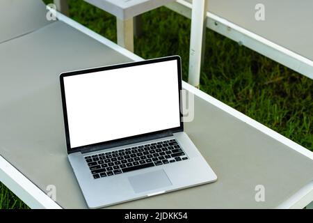 laptop with blank screen near the pool Stock Photo - Alamy