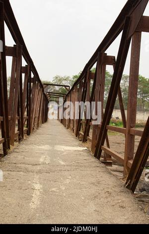 iron bridge on the river, green, waterfall Stock Photo - Alamy
