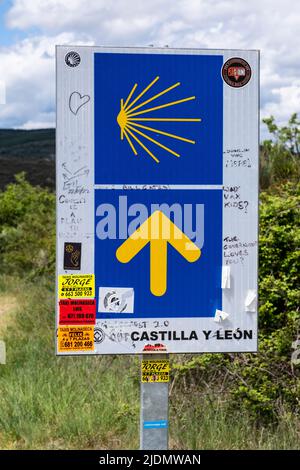 Camino to Santiago; Route Marker, scallop shell and yellow arrow on ...