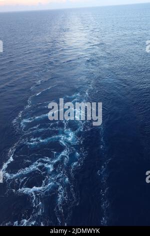 Frothy trail behind the boat on the ocean Stock Photo - Alamy
