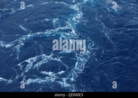 Frothy trail behind the boat on the ocean Stock Photo - Alamy