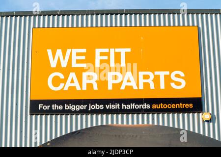 Halfords sign with information for their business, Edinburgh, Scotland ...
