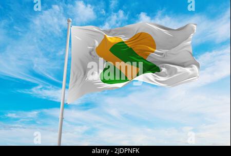flag of Champagne Ardenne, France at cloudy sky background on sunset ...