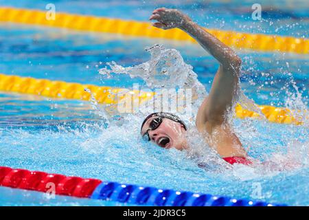 Taylor Ruck of Canada competes in the women's 100-meter backstroke ...