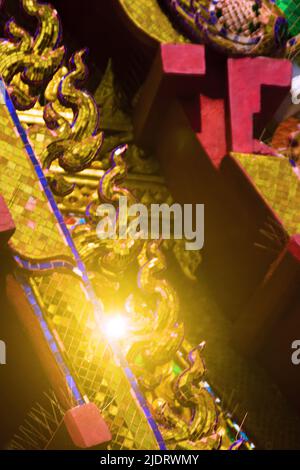 Elements of Thai Temple sculpture: dragon, three-faced janus, samsara ...