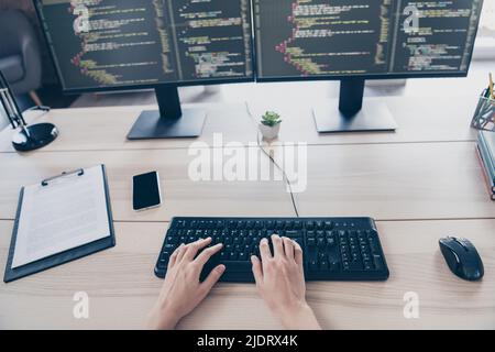 First person view of female software developer coding on computer Stock ...