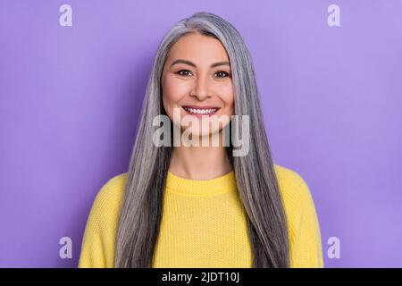 Photo of pretty sweet retired woman blue sweater arms spectacles ...