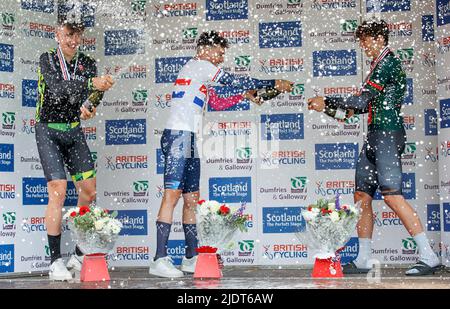 Leo Hayter (centre) celebrates victory in the Men's Under-23 time trial ...