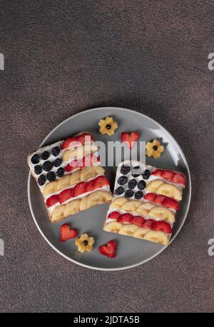 American flag sandwiches with fruit and cream cheese on rye bread on ...