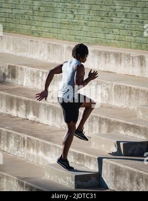 man jogging on steps Stock Photo - Alamy