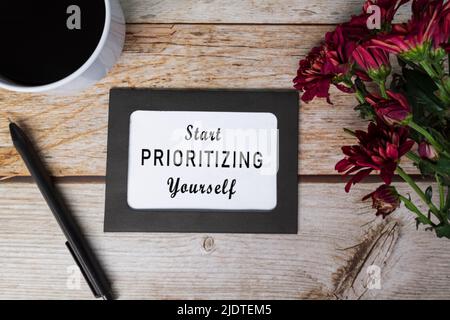 Self-care quotes, make yourself a priority words and female hands on ...