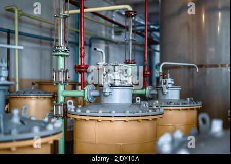 Modern sand and coal filtration columns with red pipelines Stock Photo ...