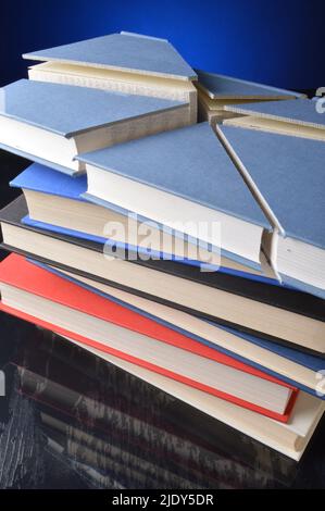 Hardbound book divided into chapters Stock Photo - Alamy