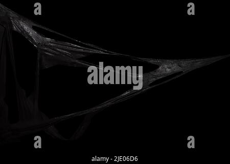 Black symbiote sismucus, sticky slime over dark background Stock Photo ...