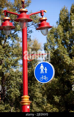 Cyclist and pedestrian route zone on a street. Painted Street Asphalt ...