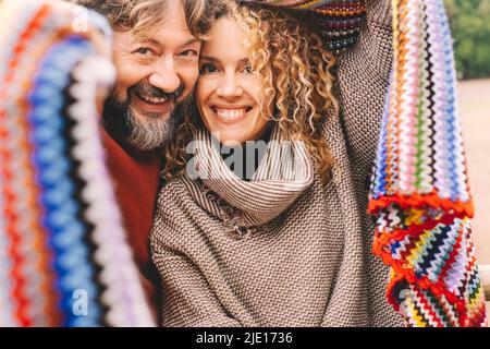 married couple hug friendship colorful t-shirts family light background ...