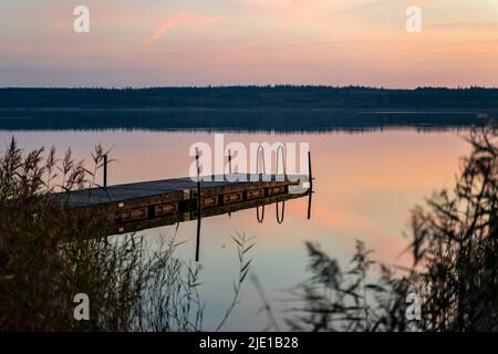 Dock in the Sunset at Vandet Lake, Denmark Stock Photo - Alamy