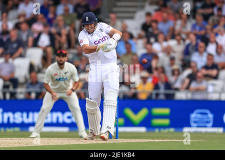 Jamie Overton of England hits a four (4) and notches up a half century ...
