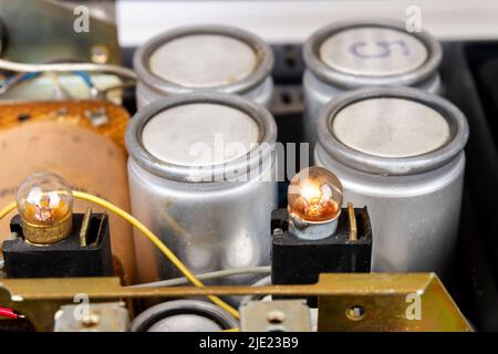 Inside view of turntable with amplifier, capacitors, coils and other ...