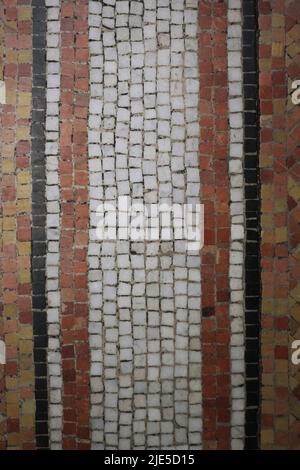Elaborate vintage square marble tile pattern on the floor as a mosaic ...