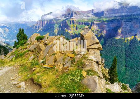 A landscape of the rocky Pyrenees mountains on a sunny day Stock Photo ...
