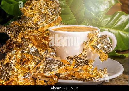 Freshly brewed cappuccino in a cup of white color on a wooden table in ...