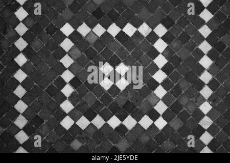 Elaborate vintage square marble tile pattern on the floor as a mosaic ...