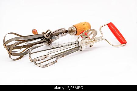vintage hand mixers or rotary whisks isolated on white background Stock ...