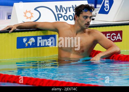 Thomas Ceccon of Italy competing in the 100m. Backstroke Men Final ...