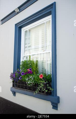 A street with traditional architecture and painted white in the village ...