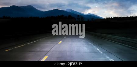 dark night road through forest and sky with red moon Stock Photo - Alamy