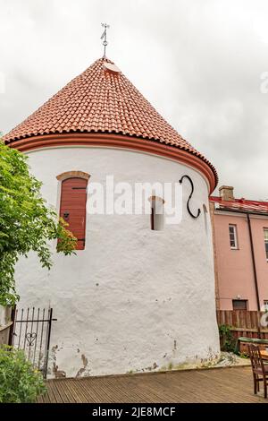 Red Tower and the fortification wall of a medieval castle in Turkish ...