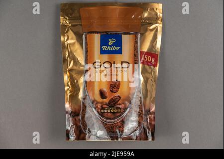 Tchibo Gold Selection coffee against gray. Tchibo German company ...