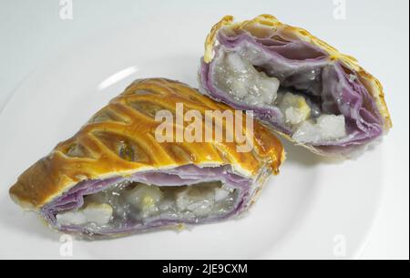Taro Pie isolated on white background, closeup studio shot Stock Photo ...
