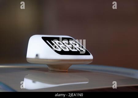 Close-up on an illuminated Uber cab sign Stock Photo - Alamy