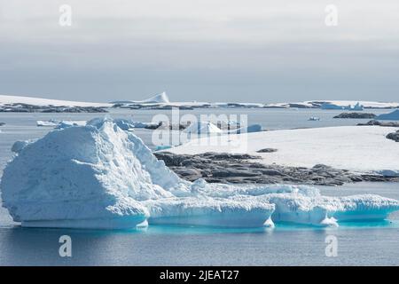 The Iceberg graveyard, Pleneau bay Port Charcot Antarctic peninsula ...