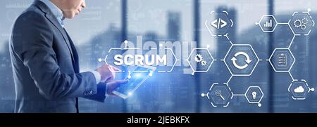 SCRUM. Hand presses the inscription scrum on a virtual panel. Agile ...
