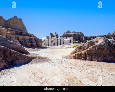 Dry Rocky Landscape of badlands National Park Along the Blue Sky Stock ...