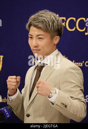 Japanese champion Naoya Inoue poses with his champion belts during a ...