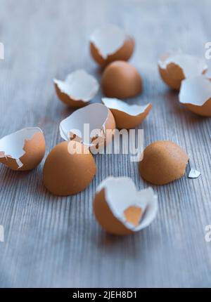 Closeup Photo of a Egg Shells over Wood Table Background. Waste ...