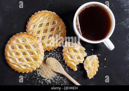 Round Apple Lattice Cakes in plate on old wooden background, top view ...