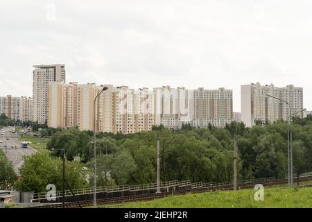 Panoramic view typical apartment complex with detached garage, covered ...