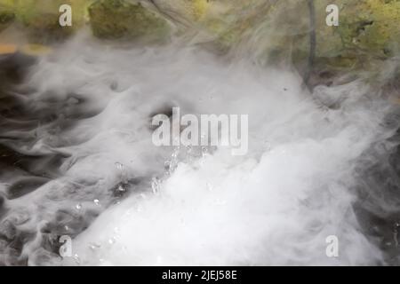 Fountains and white mist in winter and cool Stock Photo - Alamy