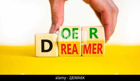 Doer or dreamer symbol. Concept words Doer or dreamer on wooden cubes ...