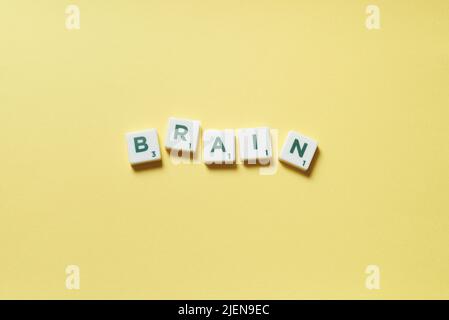 Brain formed of scrabble tiles Stock Photo - Alamy