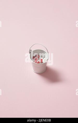 Pharmaceutical pills in the bucket Stock Photo - Alamy
